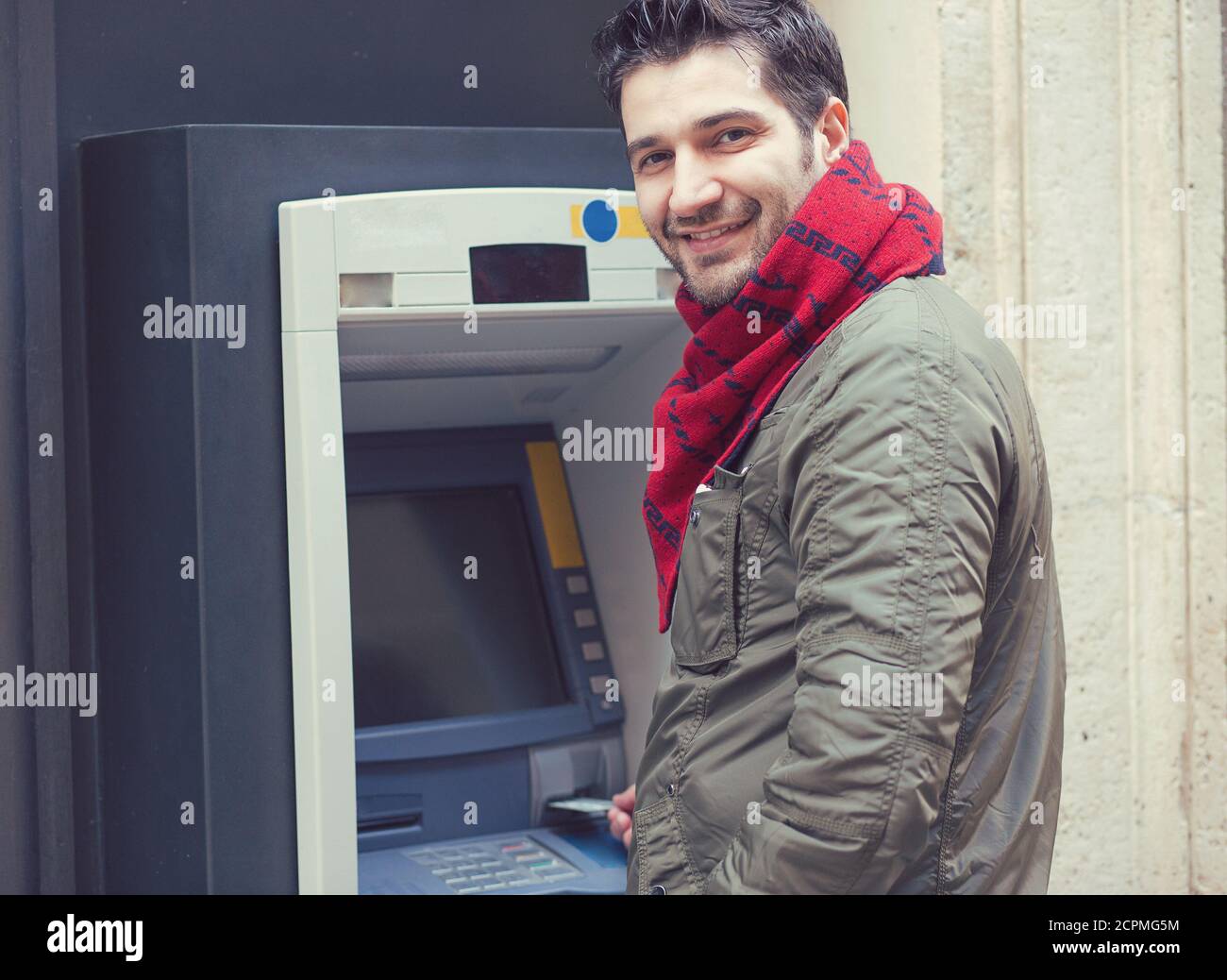 Arab man atm machine hi-res stock photography and images - Alamy