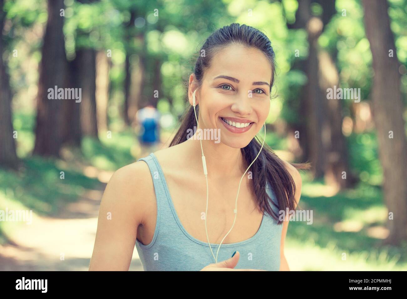 Portrait running young woman. Female runner jogging during outdoor ...