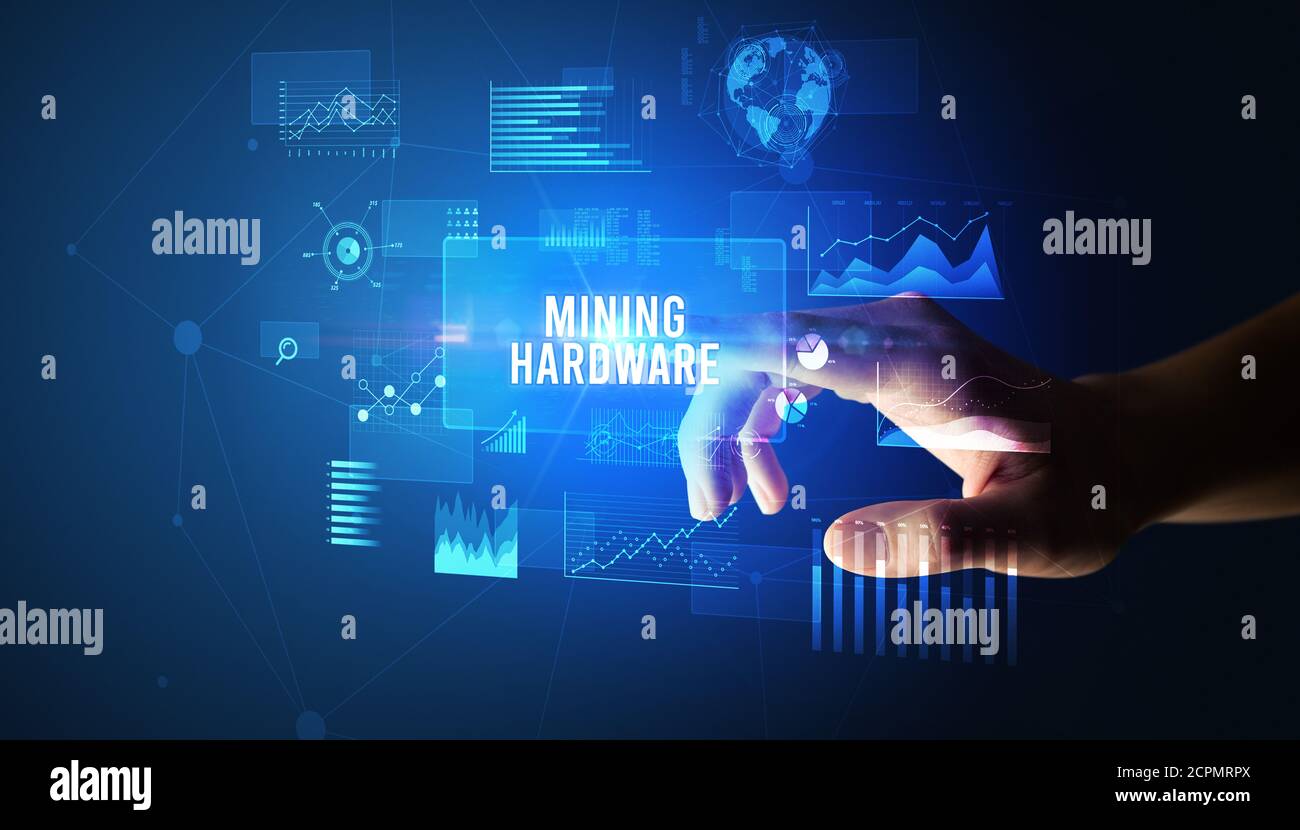 Hand touching MINING HARDWARE inscription, new business technology ...