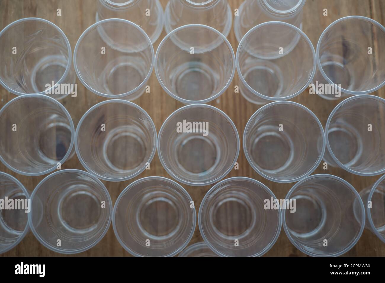 Plastic cups in rows photographed from above Stock Photo - Alamy