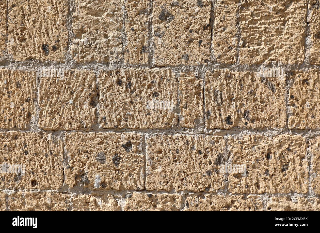 background of the volcanic stone called tuff used by the ancient ...