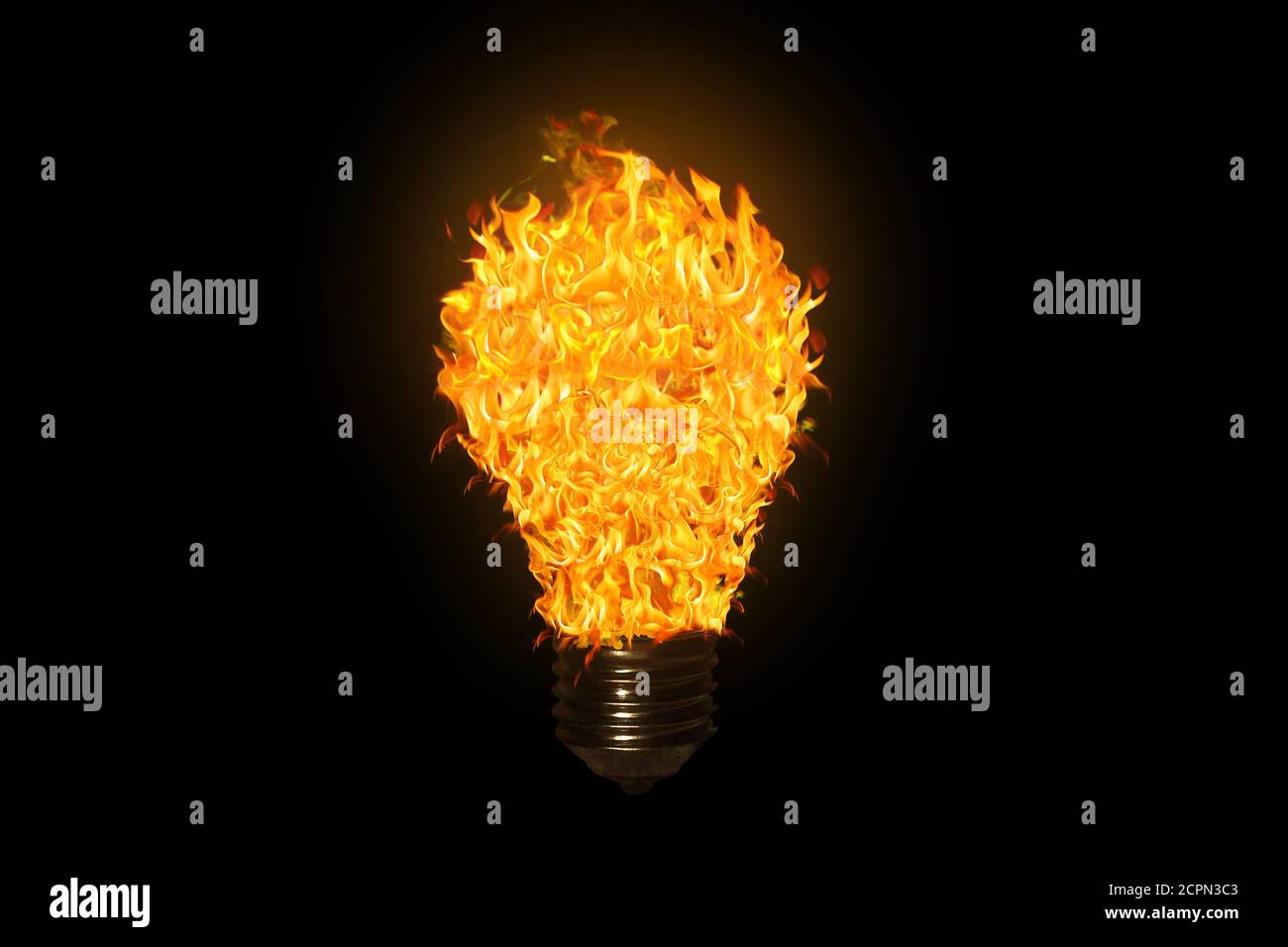 light bulb with fire isolated on black background Stock Photo - Alamy