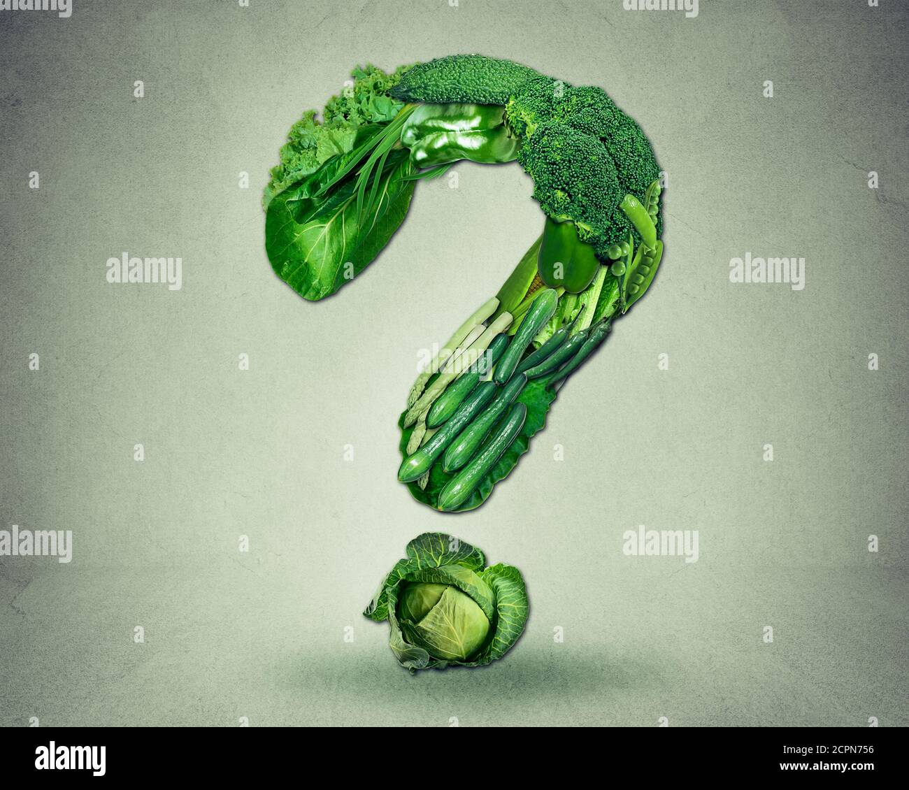 Green diet questions concept as a group of fresh fruit and vegetables ...