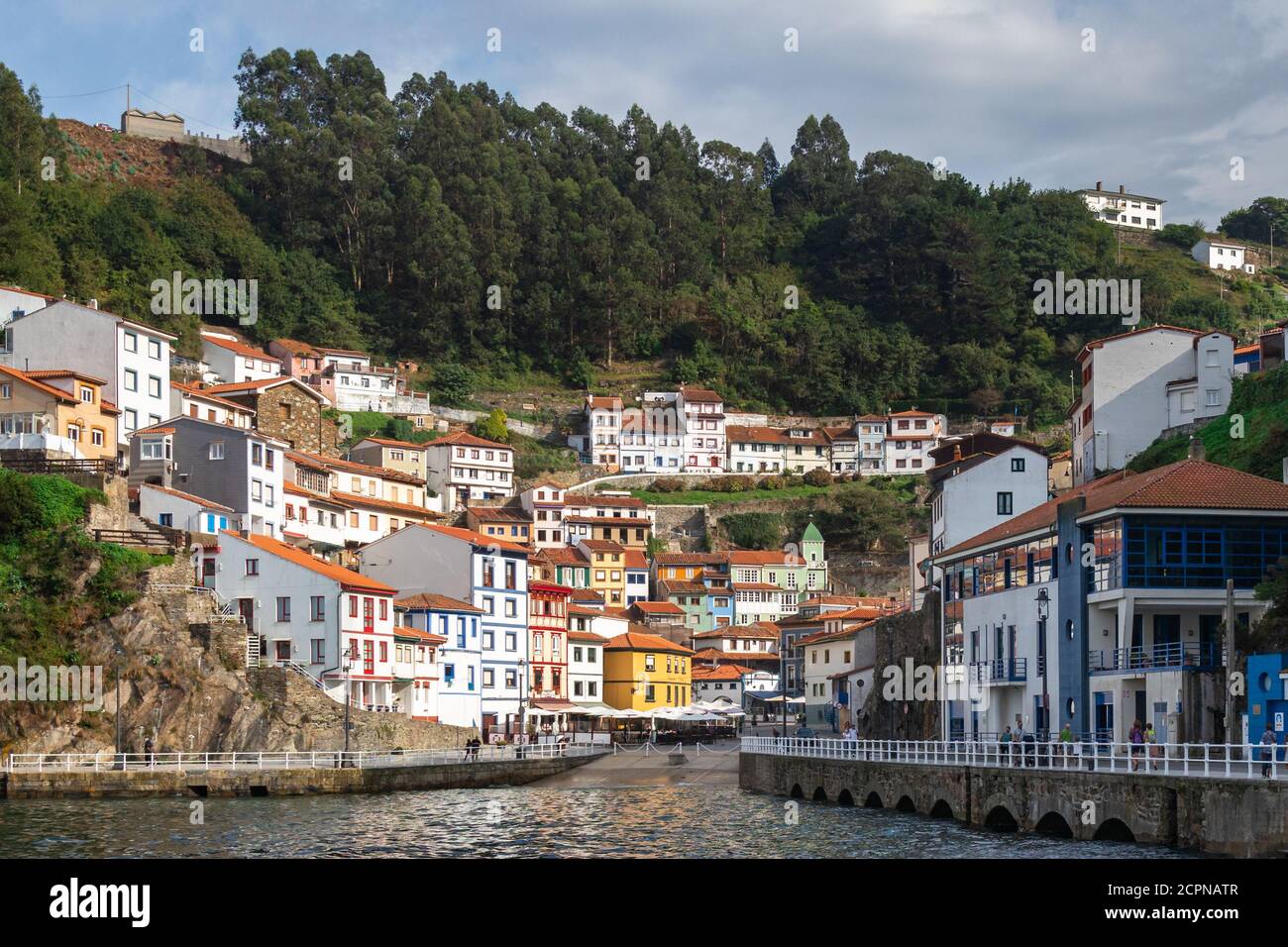 Traditional fishing village pictured from the sea. Natural harbor ...