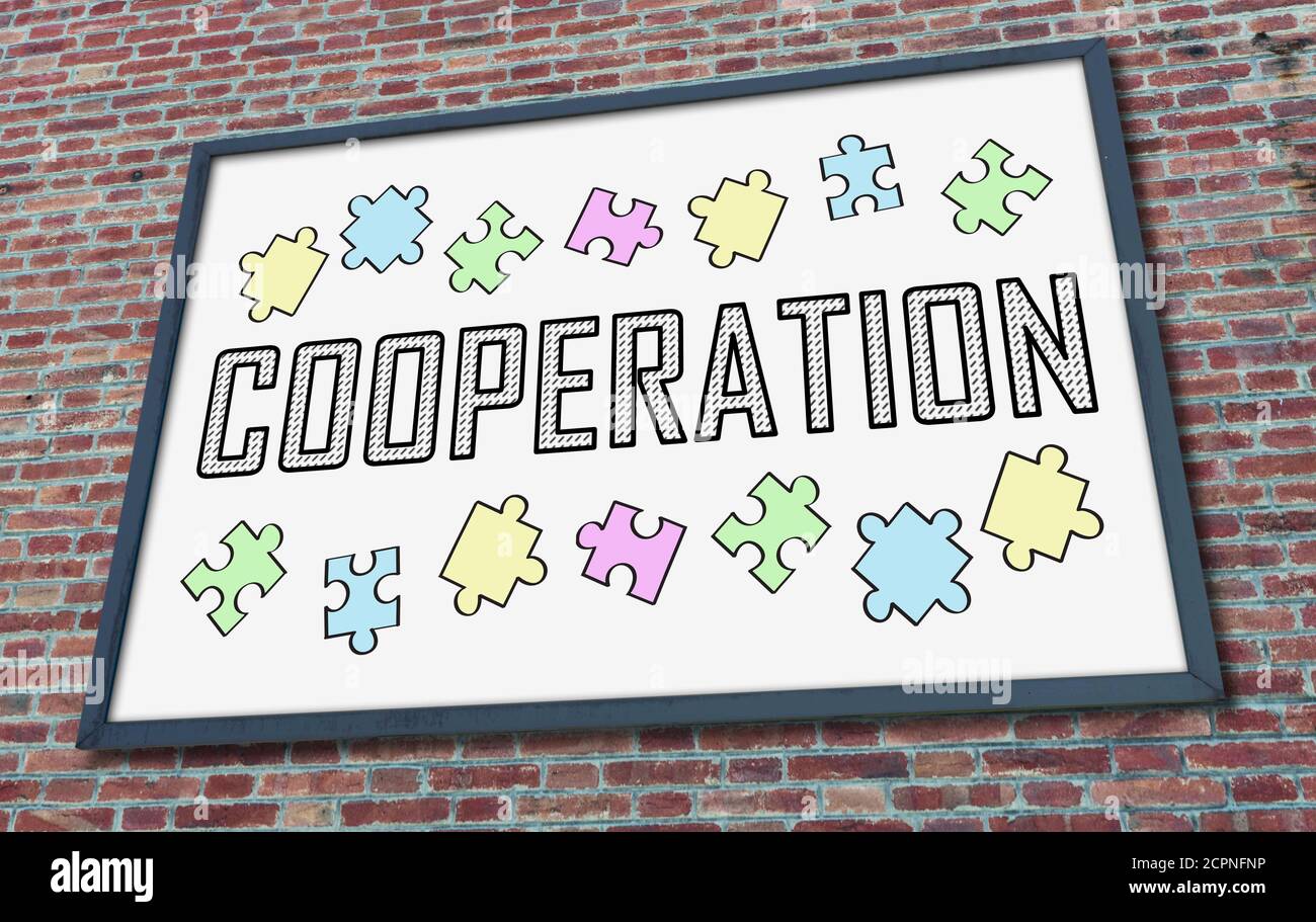 Cooperation concept drawn on a billboard fixed on a brick wall Stock ...
