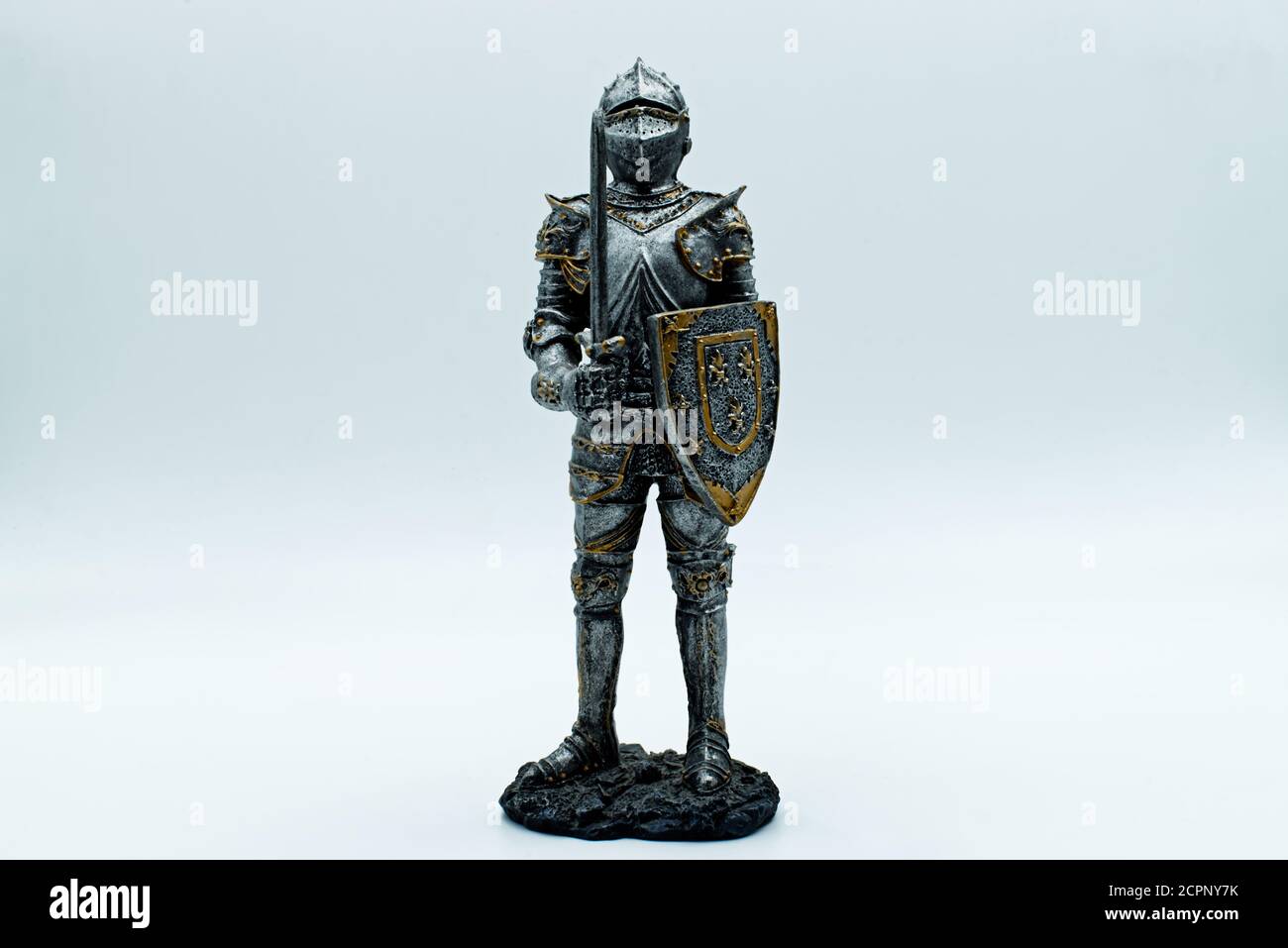 Medieval Knight in silver armour and sword Stock Photo - Alamy