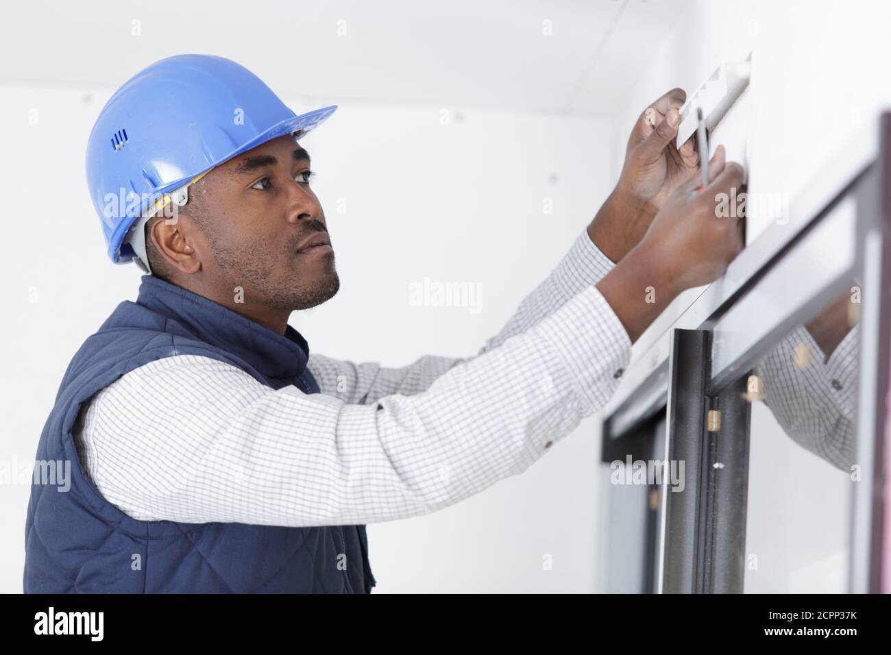 Builder screws screw wall hi-res stock photography and images - Alamy