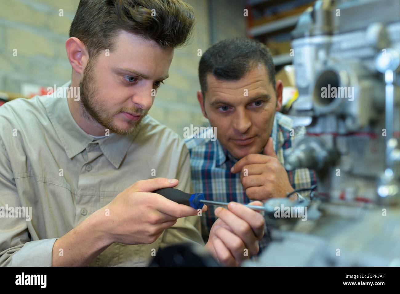 working with metal tools Stock Photo - Alamy