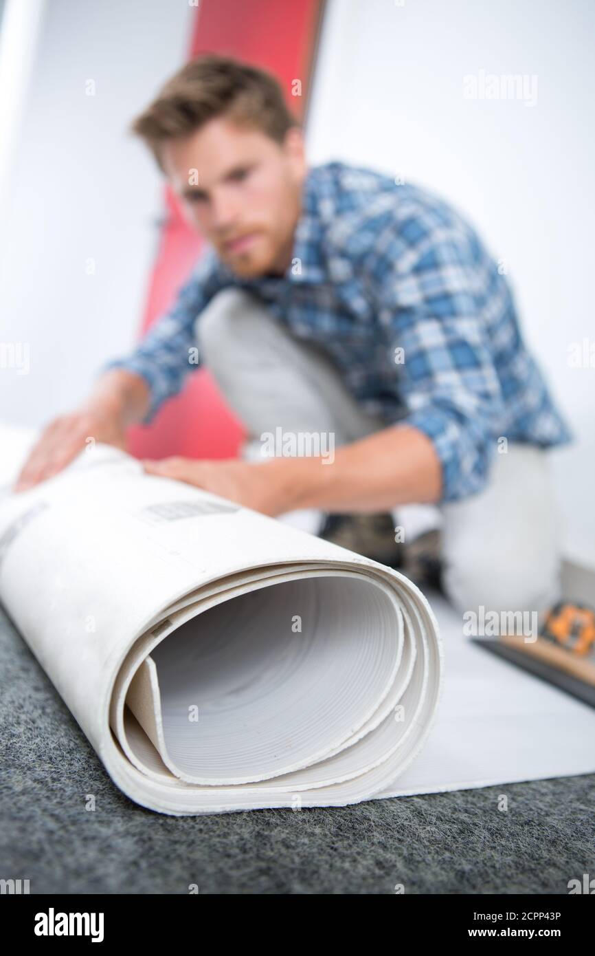 Laying floor coating hi-res stock photography and images - Alamy