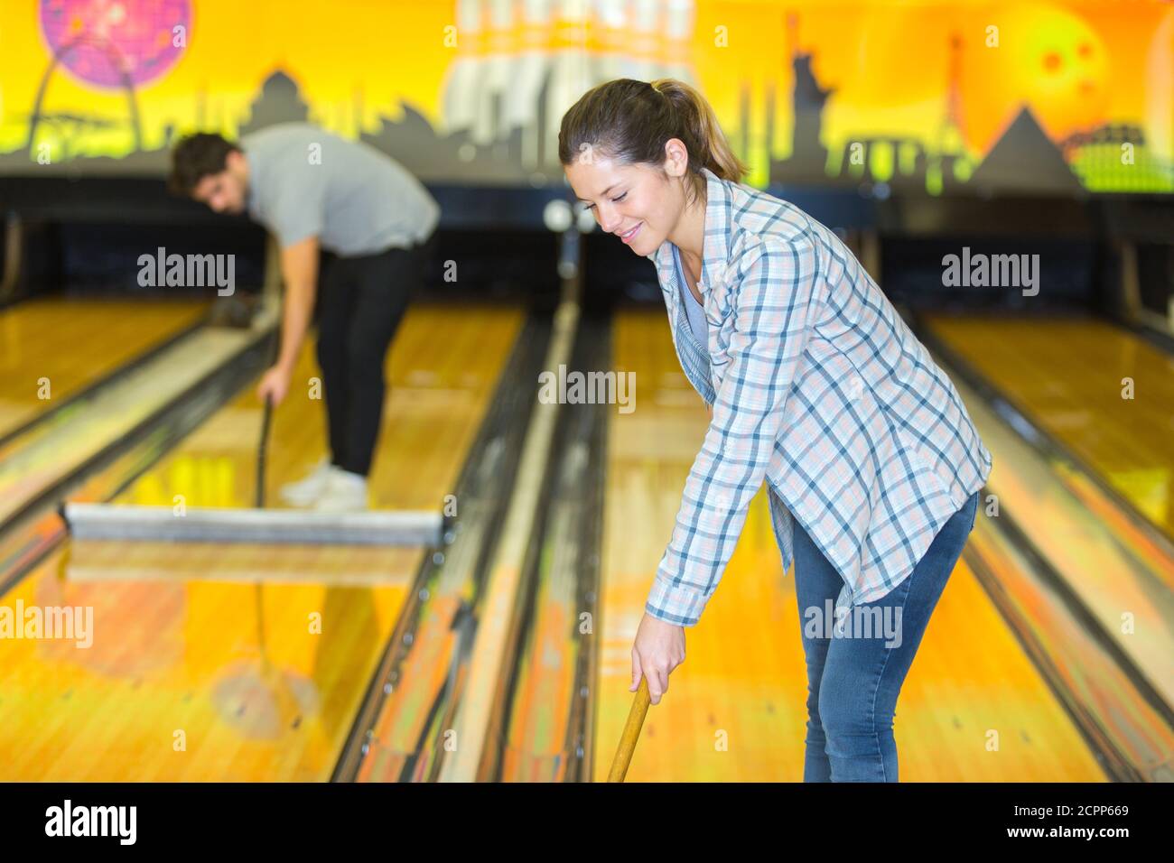 cleaning bowling center Stock Photo - Alamy