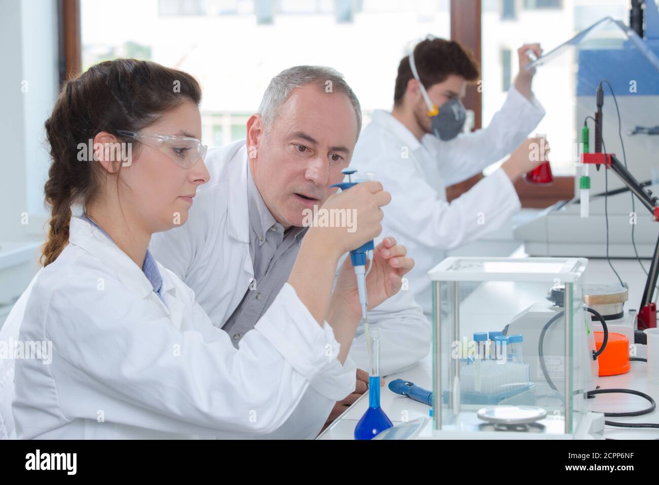portrait of teacher and students in biology class Stock Photo - Alamy