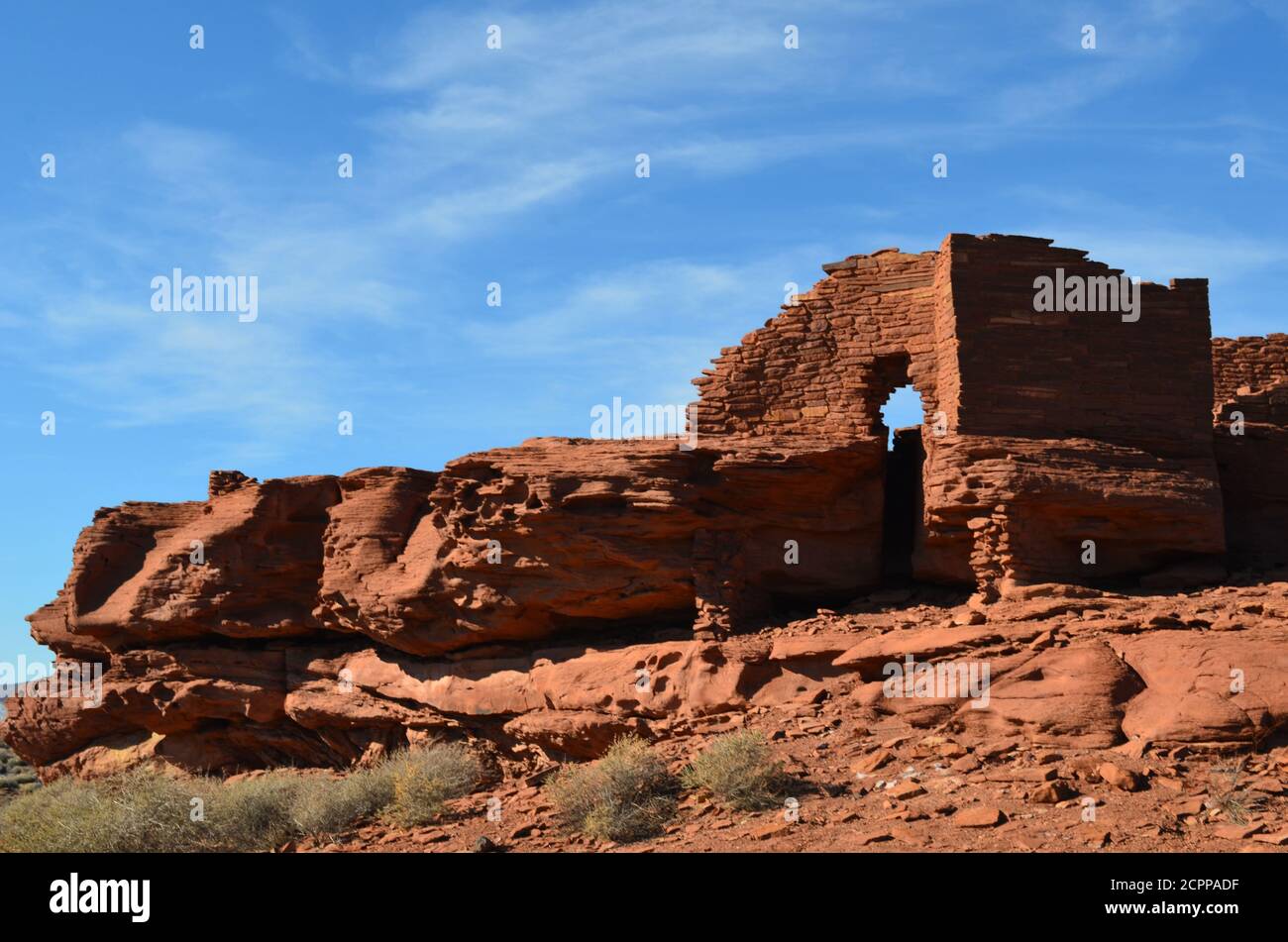 Red rock standing walls of Wukoki ruins Stock Photo - Alamy