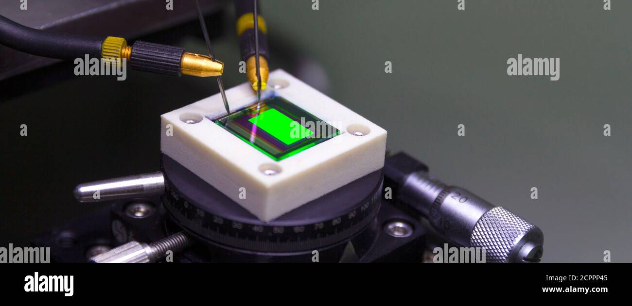 Checking turn on small oled display of green color with a probe station ...