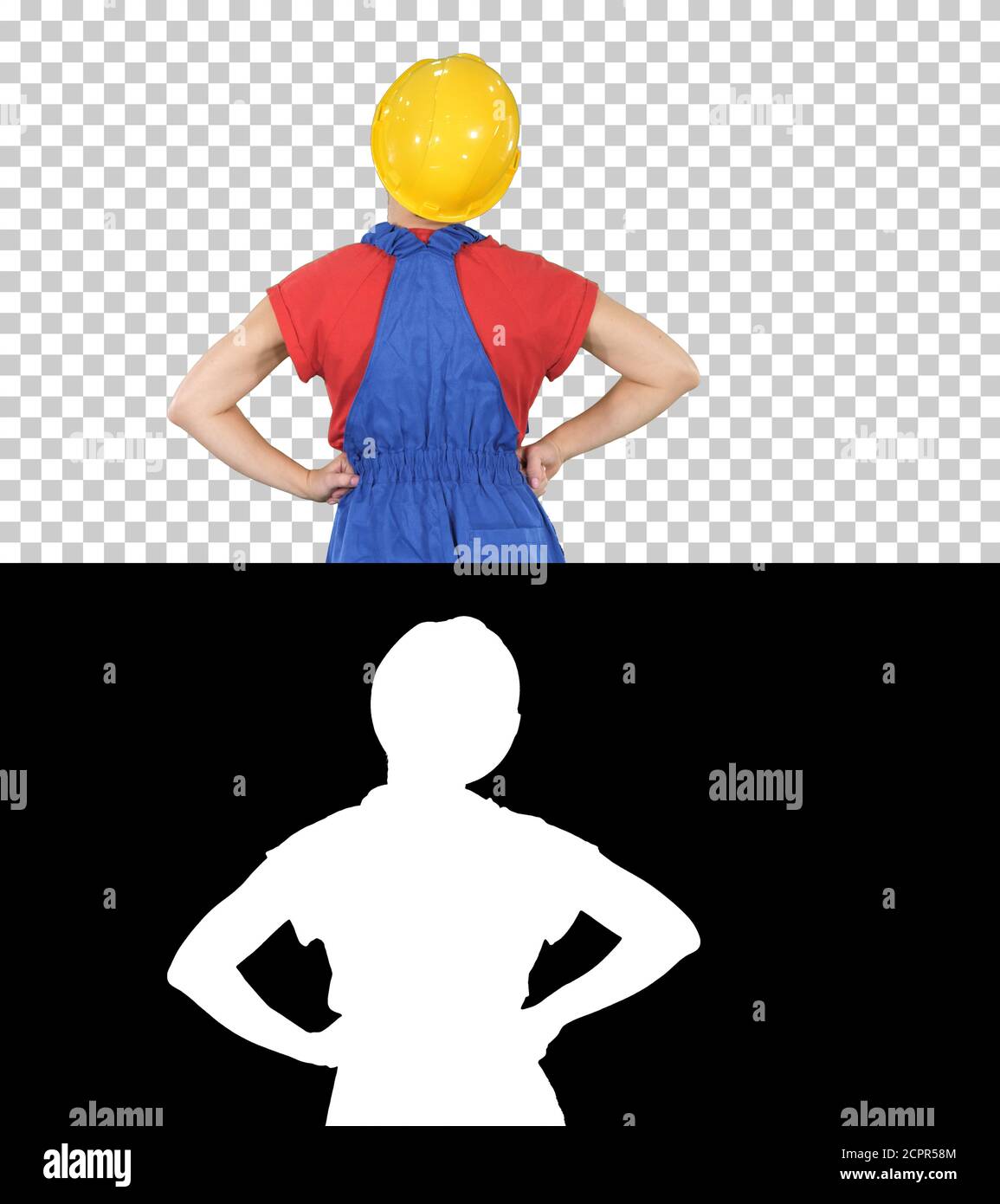 Female construction worker with hands on hips looking at somethi Stock ...