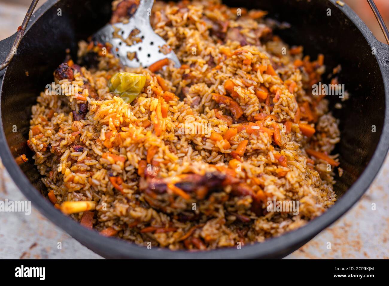 Step cooking pilaf in cauldron hi-res stock photography and images - Alamy