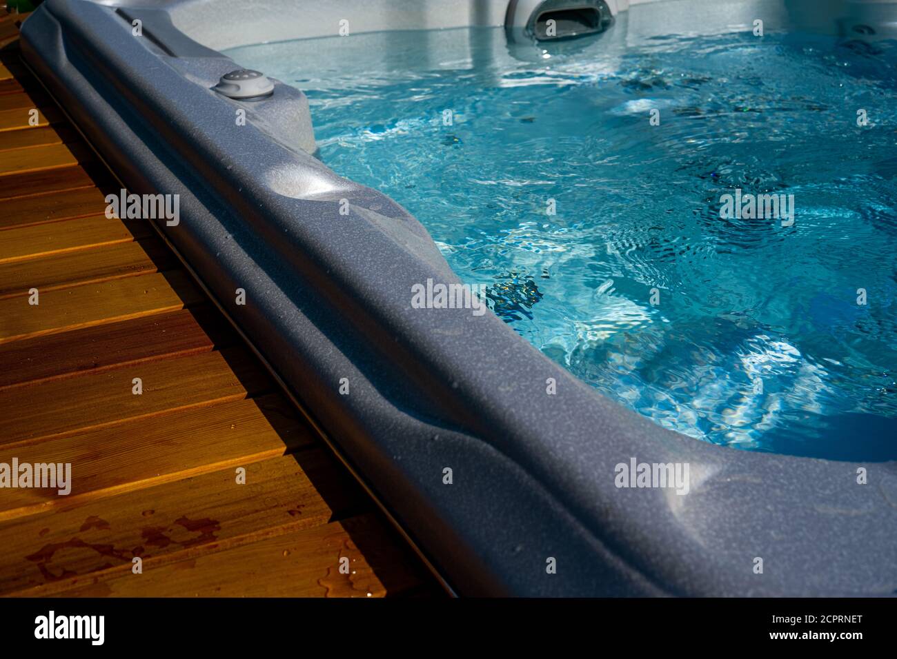 Luxury SPA. Closeup of water in hot bath tubs at spa. Blue clear fresh ...
