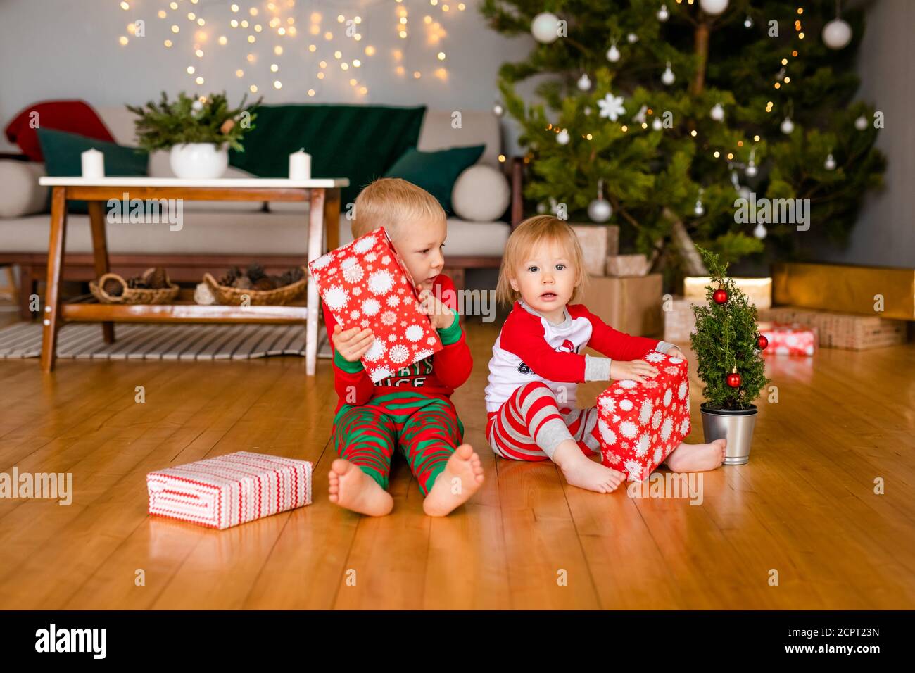 Kids Opening Christmas Presents Gif