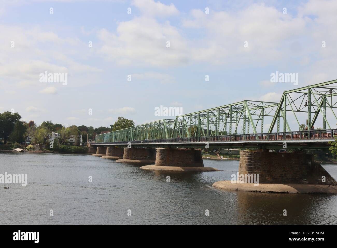The bridge spans the river connecting the 2 states Stock Photo - Alamy