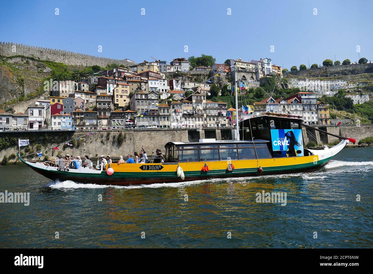 Cruise ships for tourists on the Douro River in Porto in Portugal. The ...