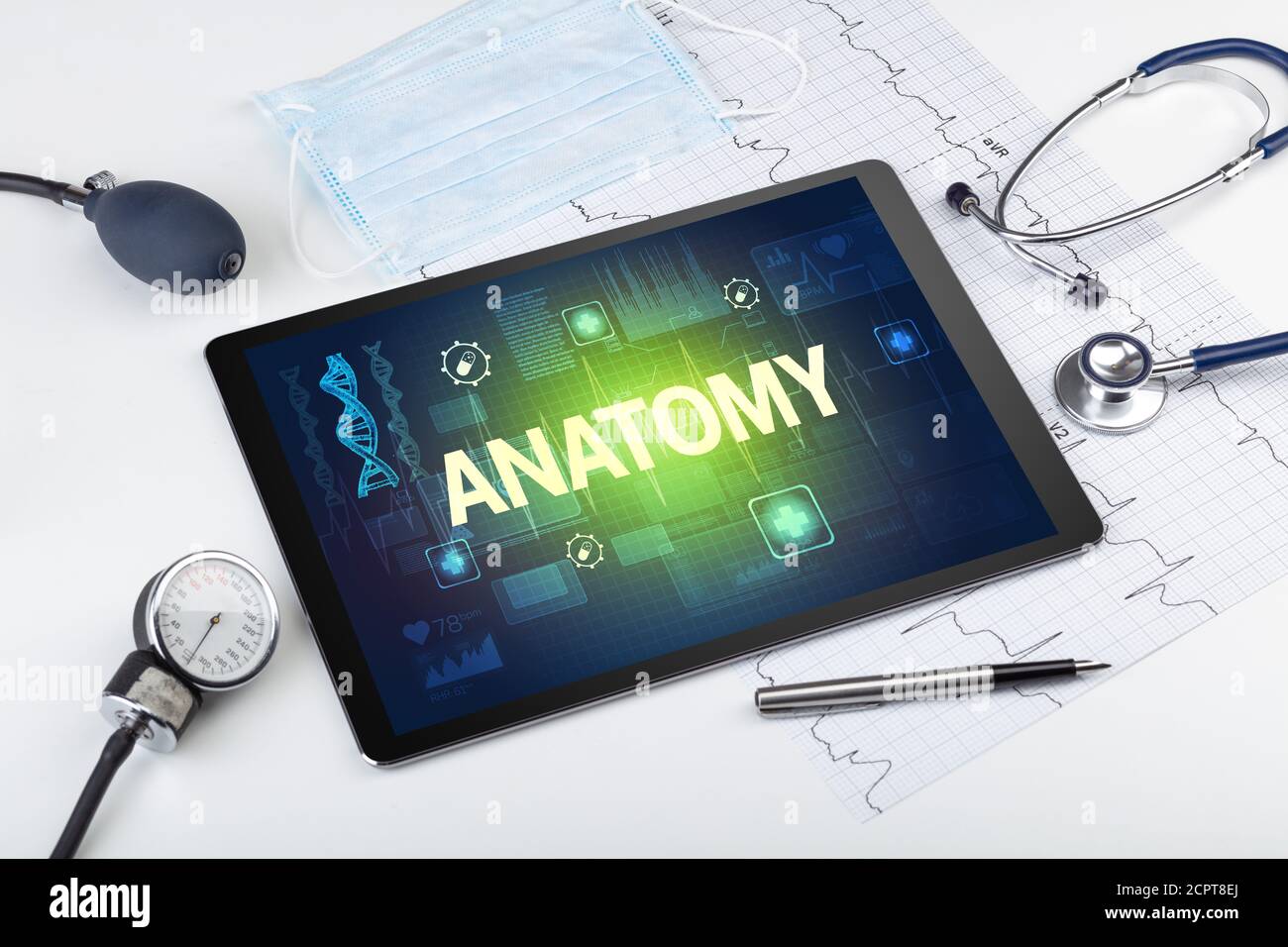 Tablet pc and medical stuff with ANATOMY inscription, prevention ...