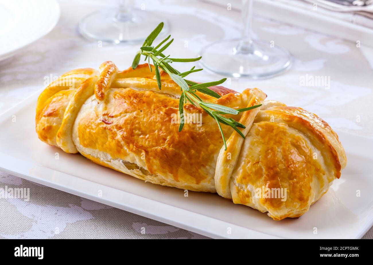 Beef Wellington, prepared in puff pastry Stock Photo - Alamy