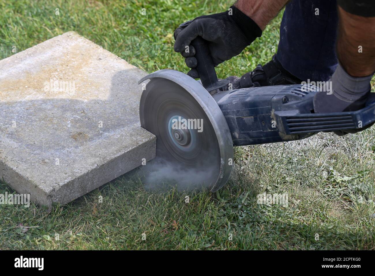 Industrial construction worker using a professional angle grinder Stock ...