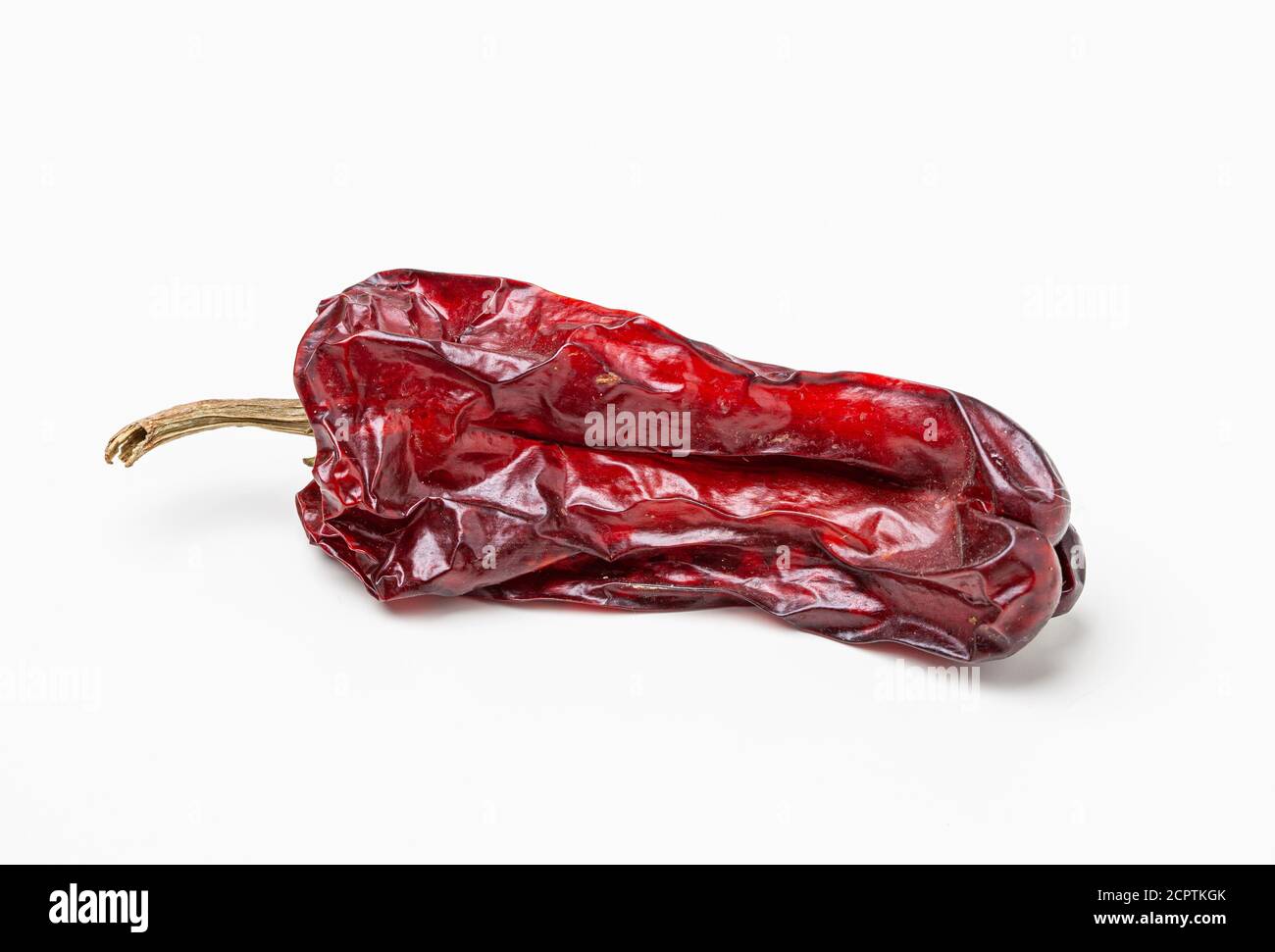 Dried bell pepper isolated on white Stock Photo - Alamy