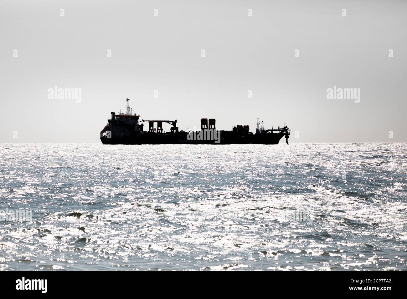 The Vox Amalia in silhouette off Hythe beach Stock Photo - Alamy
