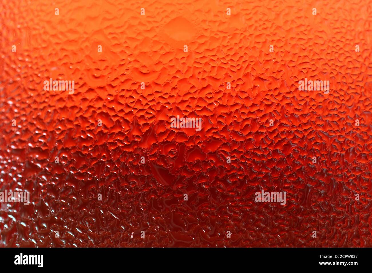 Water Droplets Texture of a Glass of Vibrant Red Chilled Drink Stock ...