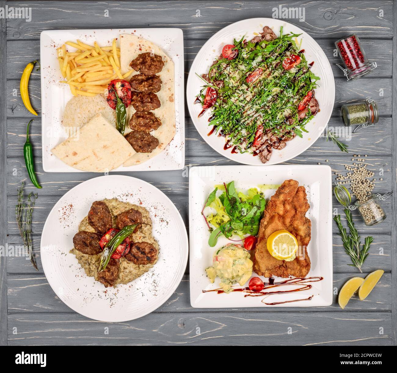 Different dishes on the table in the restaurant Stock Photo - Alamy