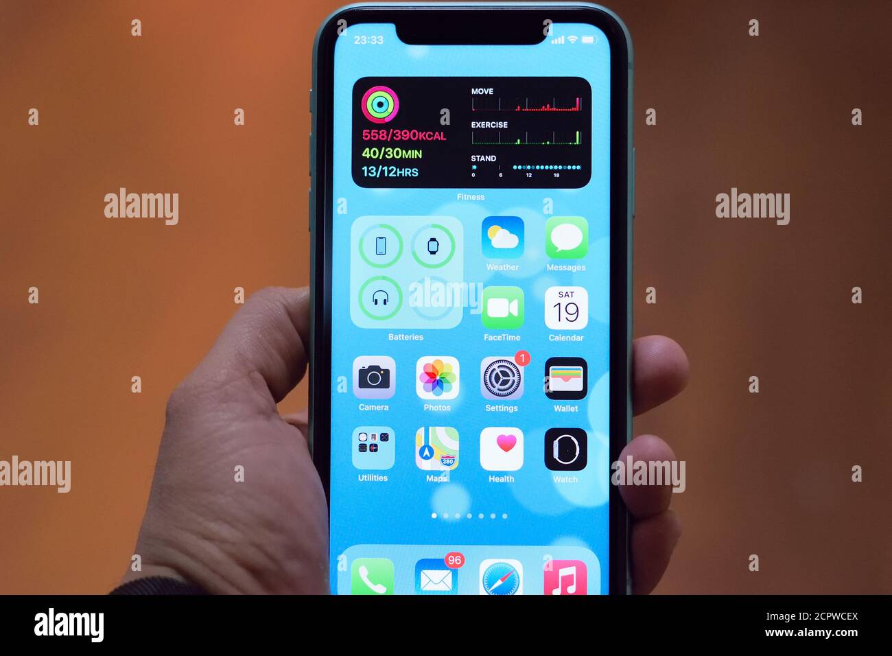 iPhone 11 with new home screen widgets of iOS14. The latest version of ...