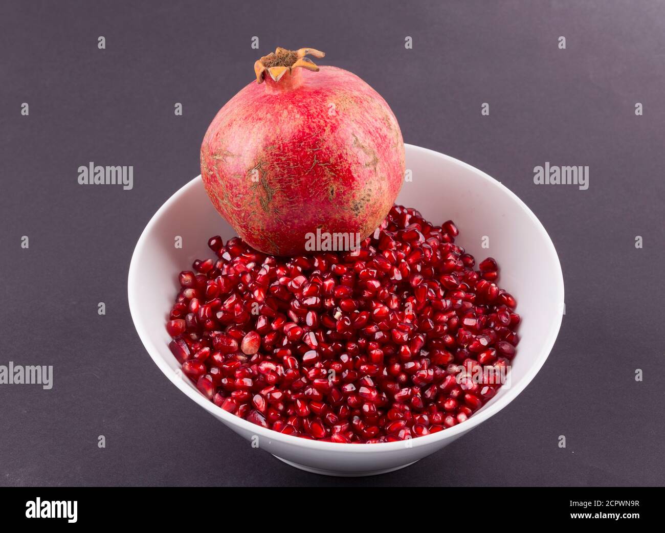 Green pomegranate close hi-res stock photography and images - Alamy