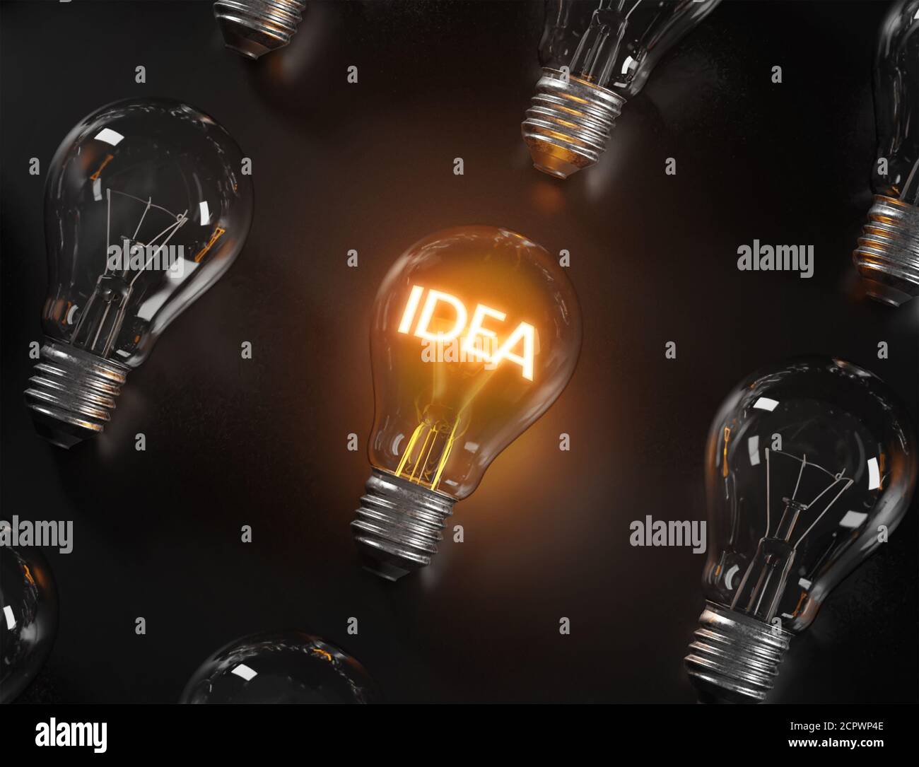 Glowing light bulb with the word idea Stock Photo - Alamy
