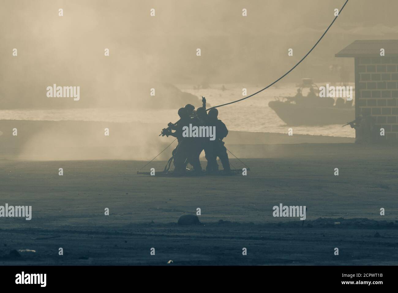 Military chopper takes off in combat and war flying into the smoke and ...