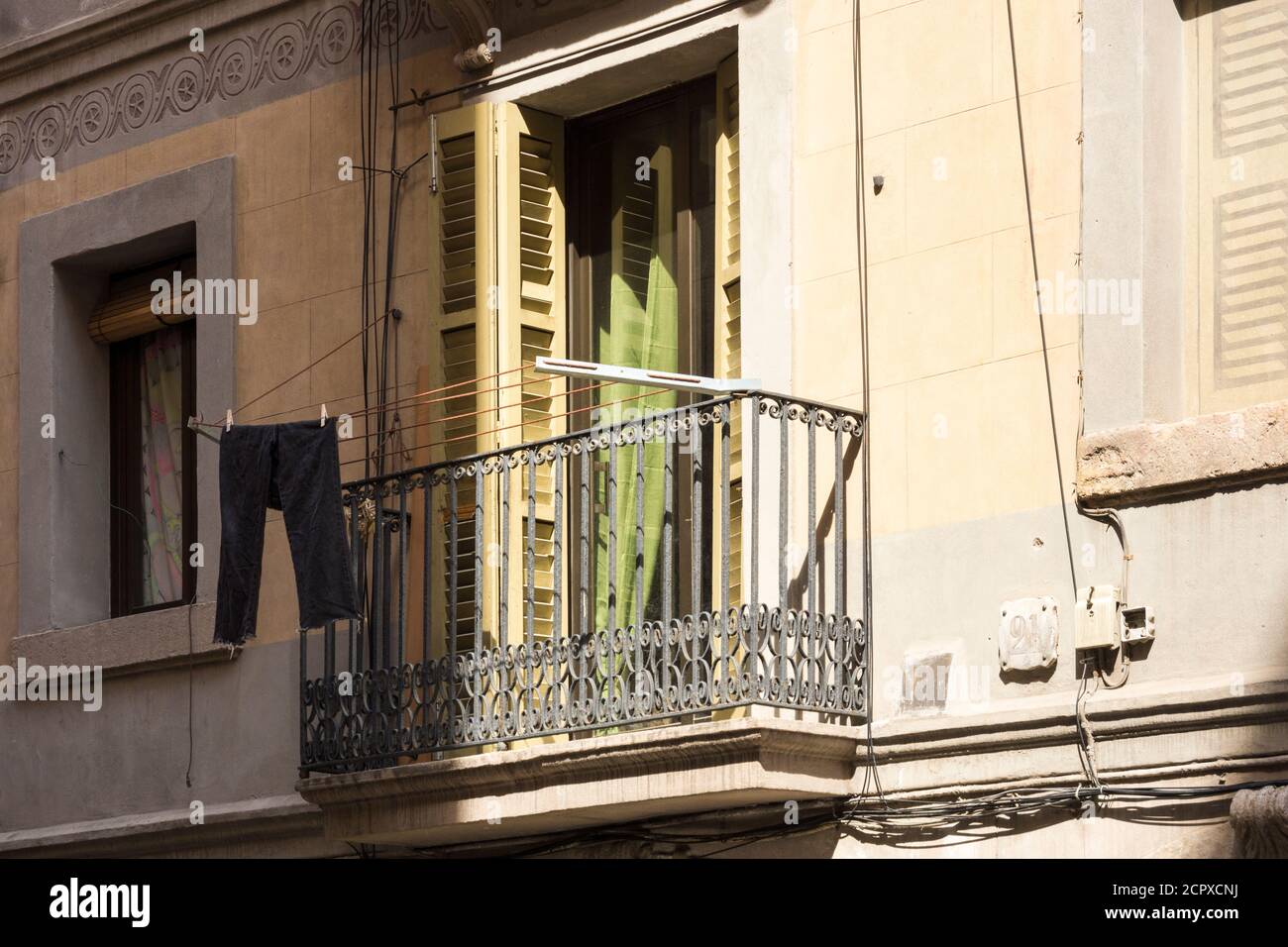 Barcelona, port district, La Barceloneta, alley, balcony, pants Stock ...