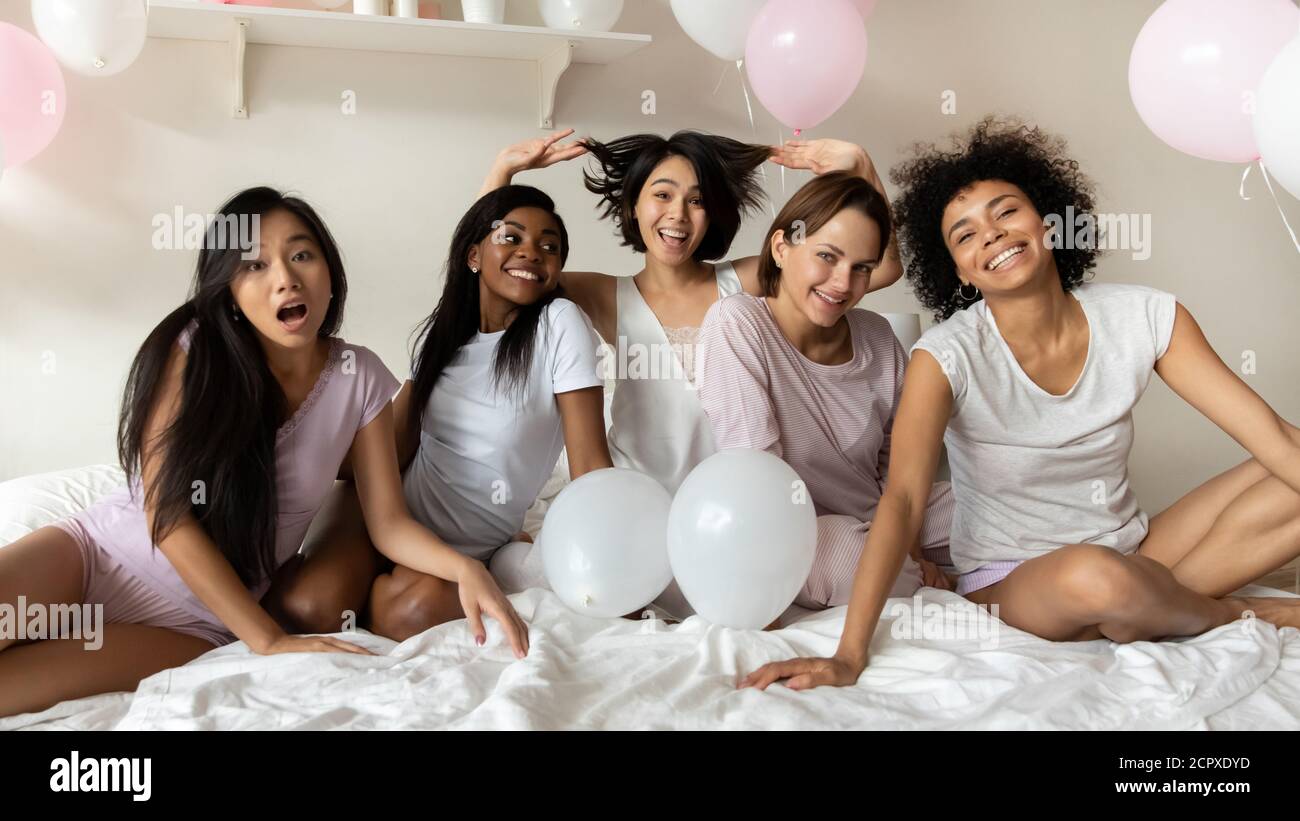 Portrait of playful funny attractive young mixed race friends Stock ... Portrait of playful funny attractive young mixed race friends Stock ...