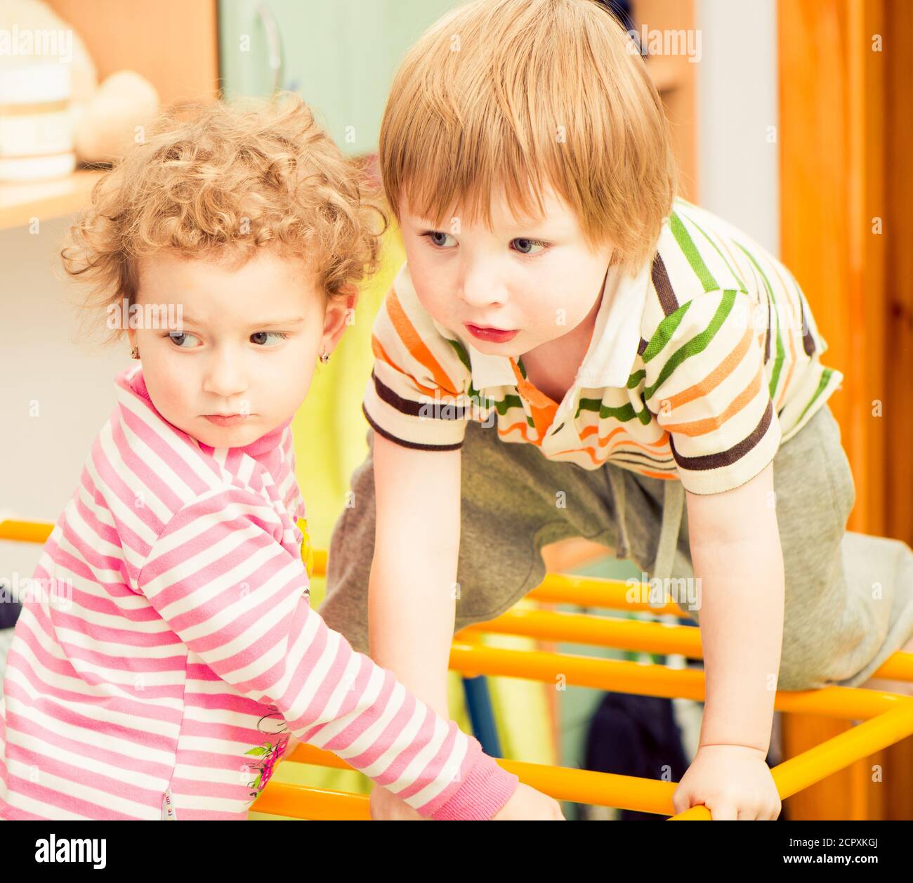 little kids having fun indoor Stock Photo - Alamy