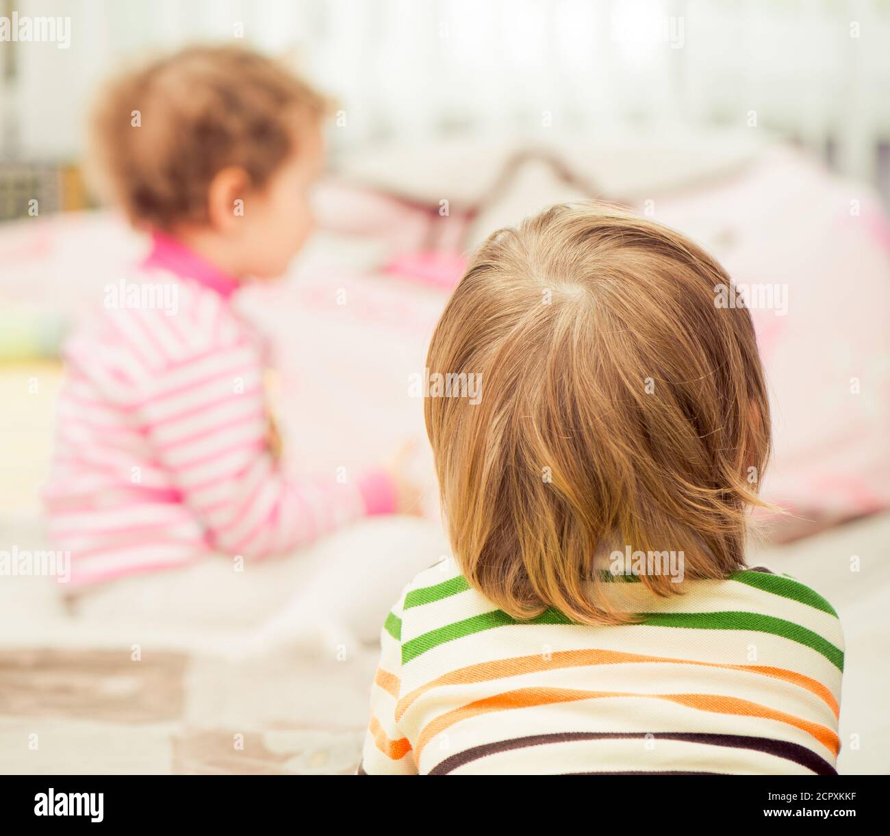 little kids having fun indoor Stock Photo - Alamy