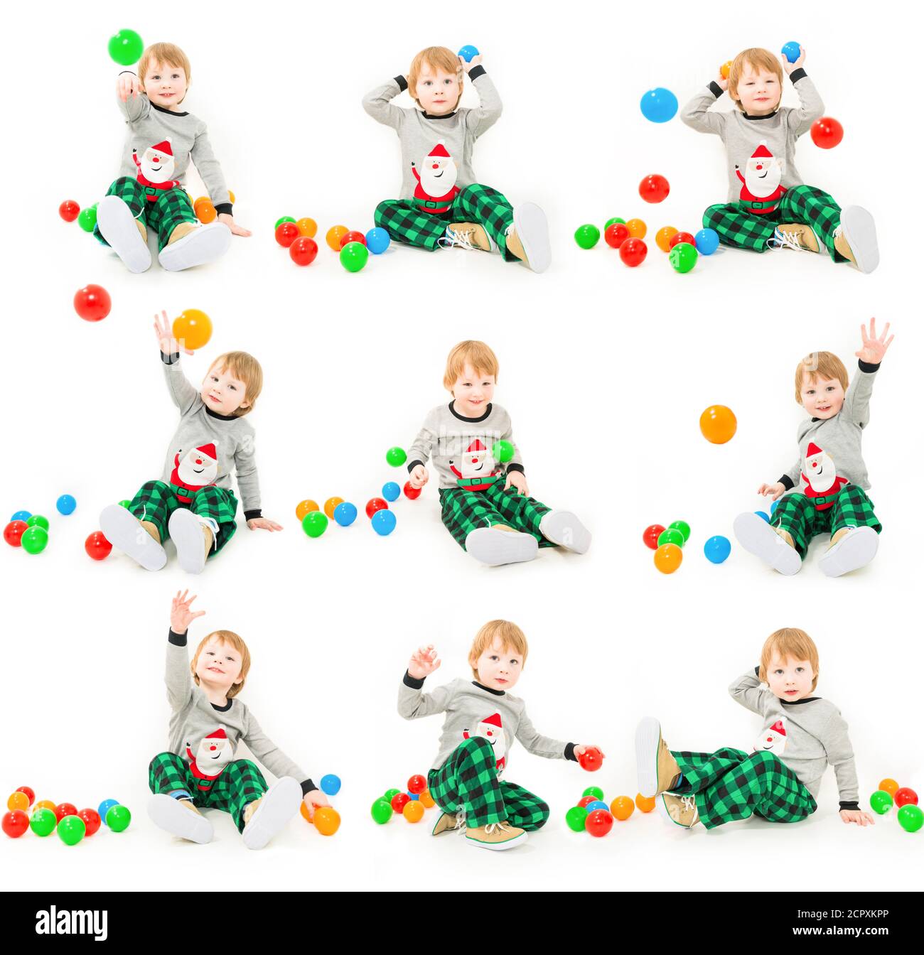 Little caucasian boy playing with colorful balls isolated at white ...