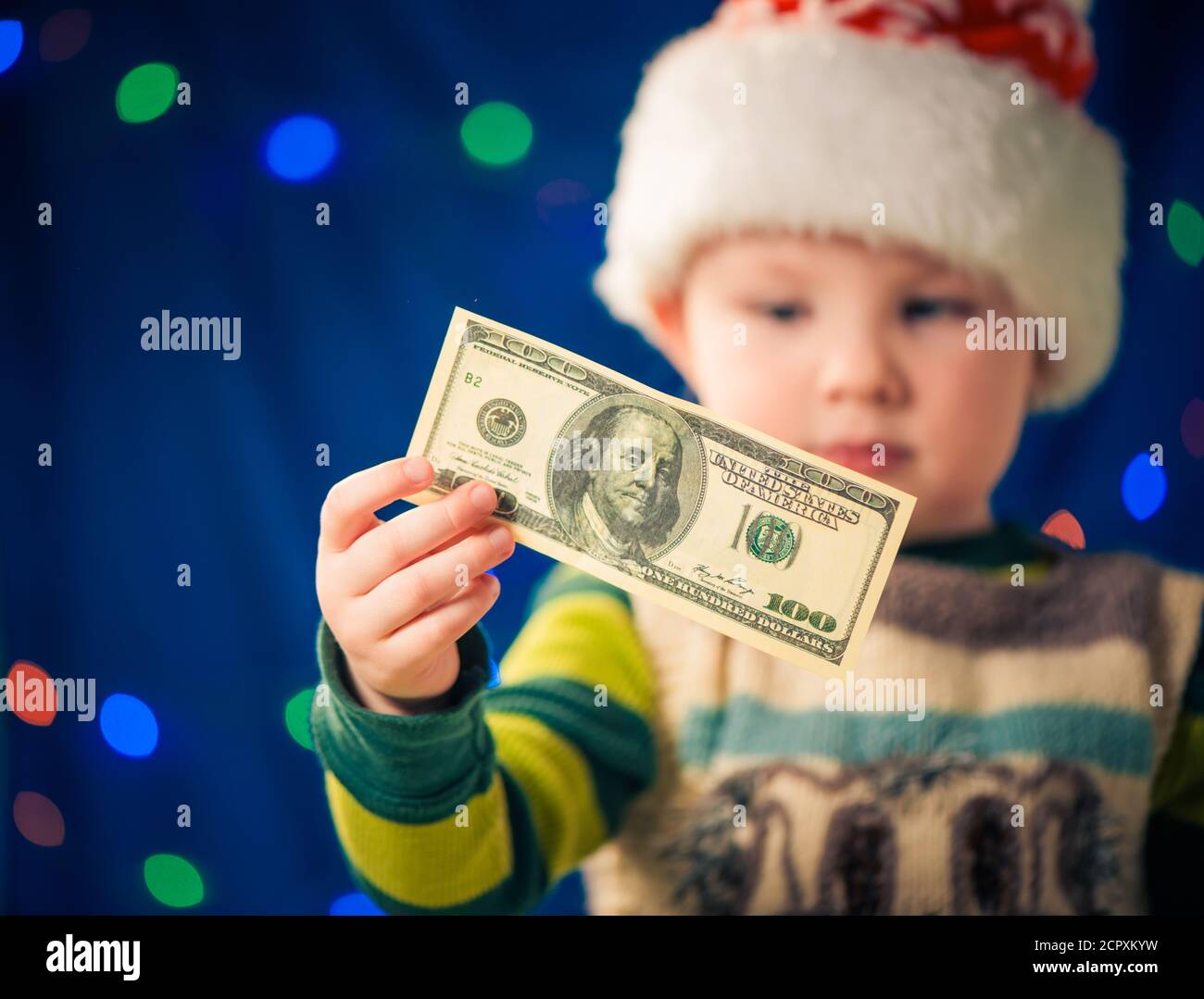 little boy portrait on holiday lights background Stock Photo - Alamy