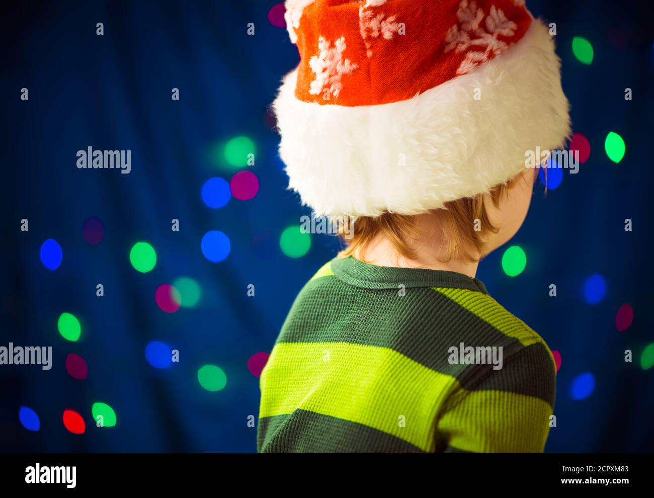 little boy portrait on holiday lights background Stock Photo - Alamy