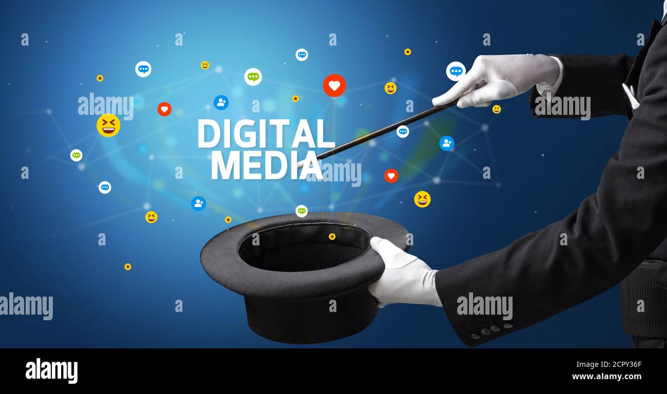 Magician is showing magic trick with DIGITAL MEDIA inscription, social ...