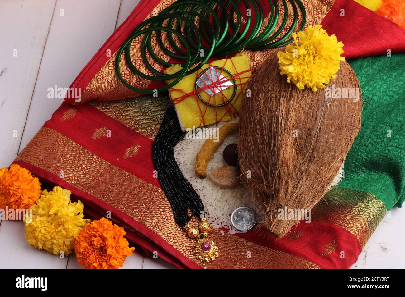 oti bharne- Indian ritual of offering a sari and a blouse piece along ...