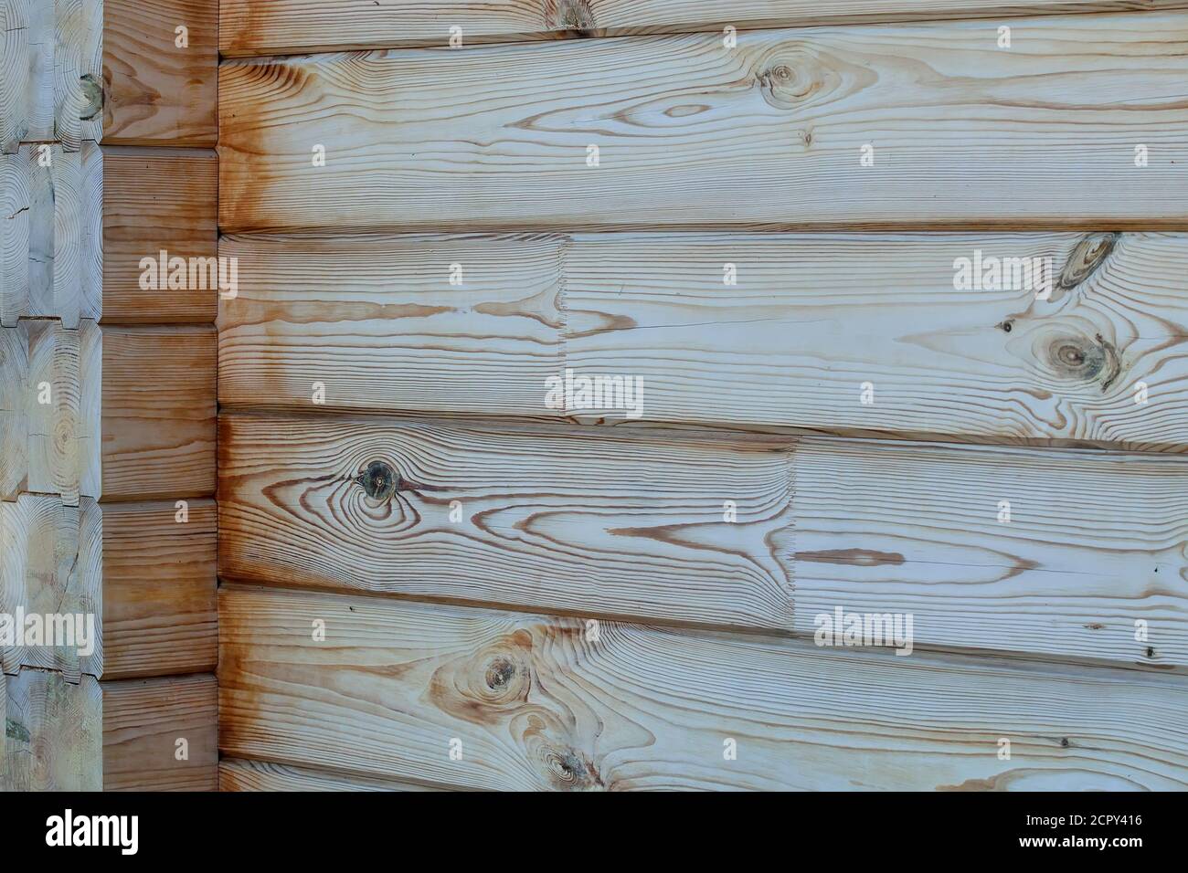 Fragment of a wooden house made of deciduous timber close-up Stock ...