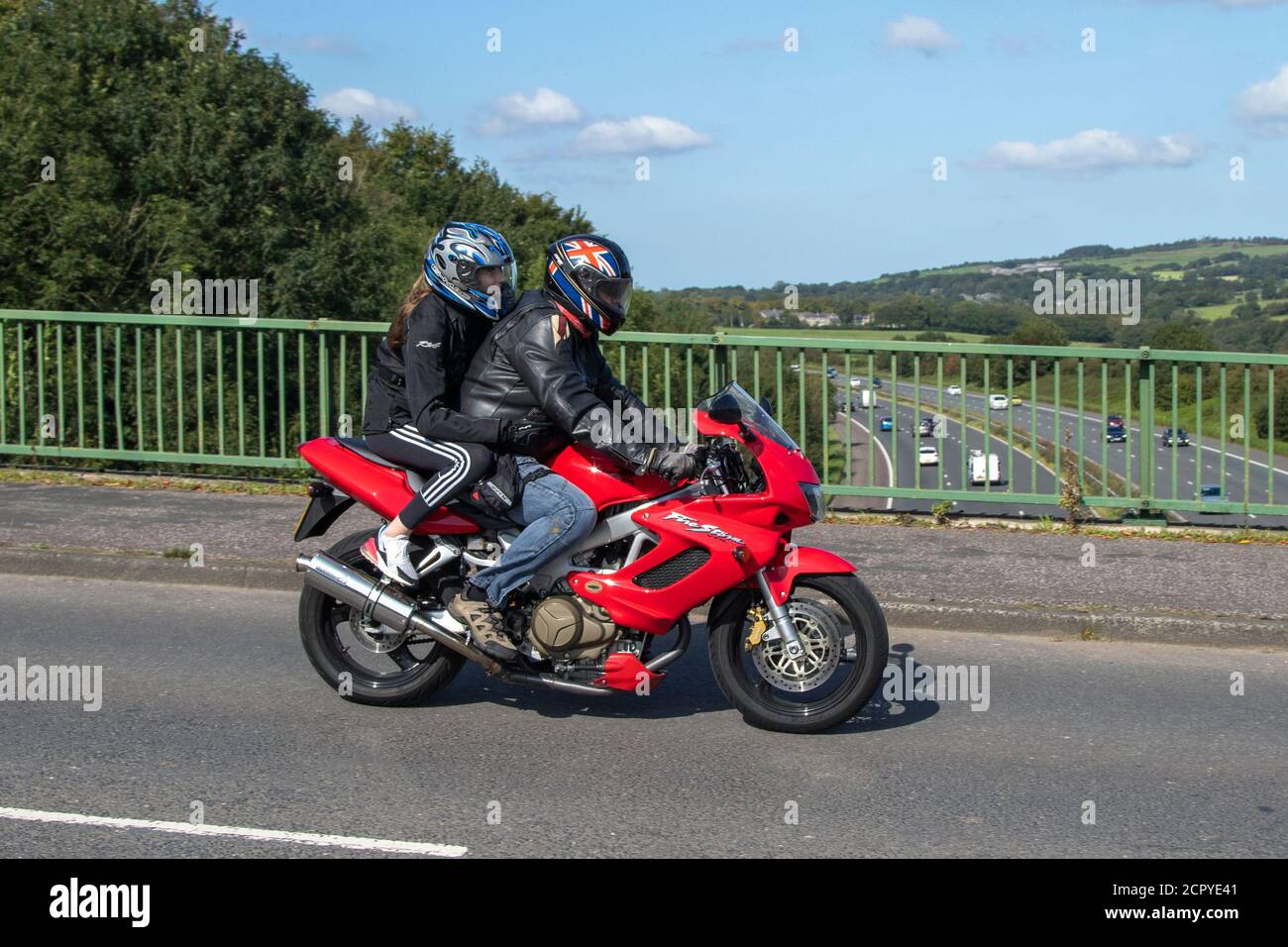 2005 red Honda VTR 1000 F-4 Motorbike rider; two-wheeled transport ...