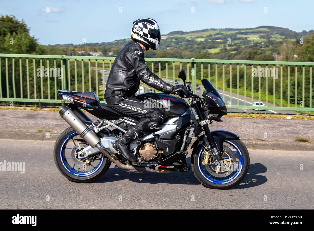 Aprilia Motorbike rider; two wheeled transport, motorcycles, vehicle ...