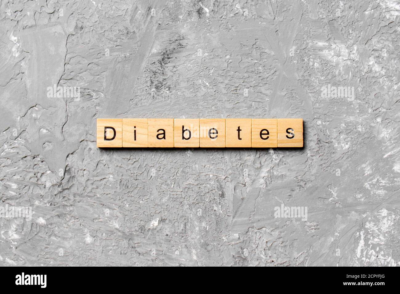 diabetes word written on wood block. diabetes text on table, concept ...