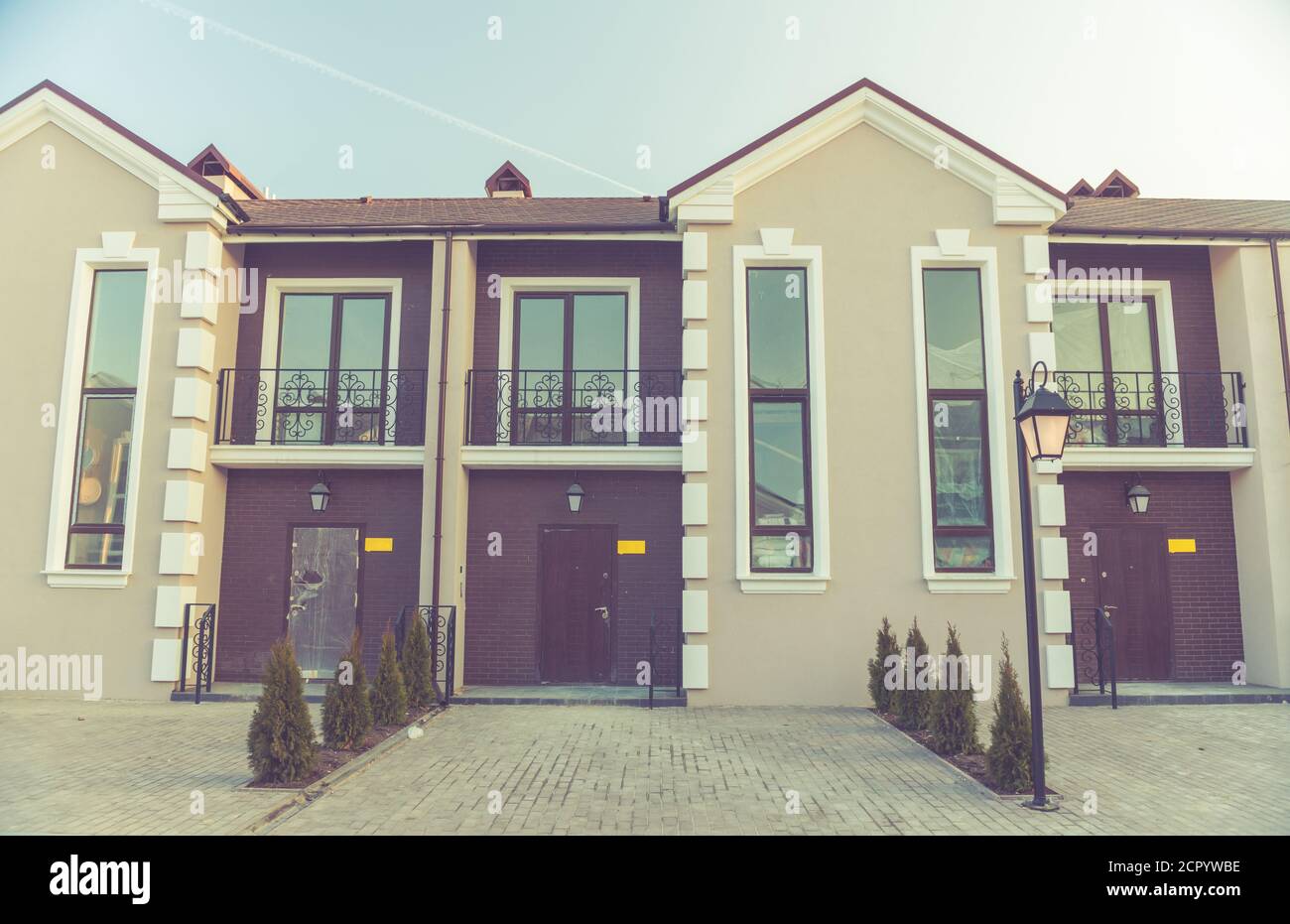 uptown street block houses at summer sunset Stock Photo - Alamy