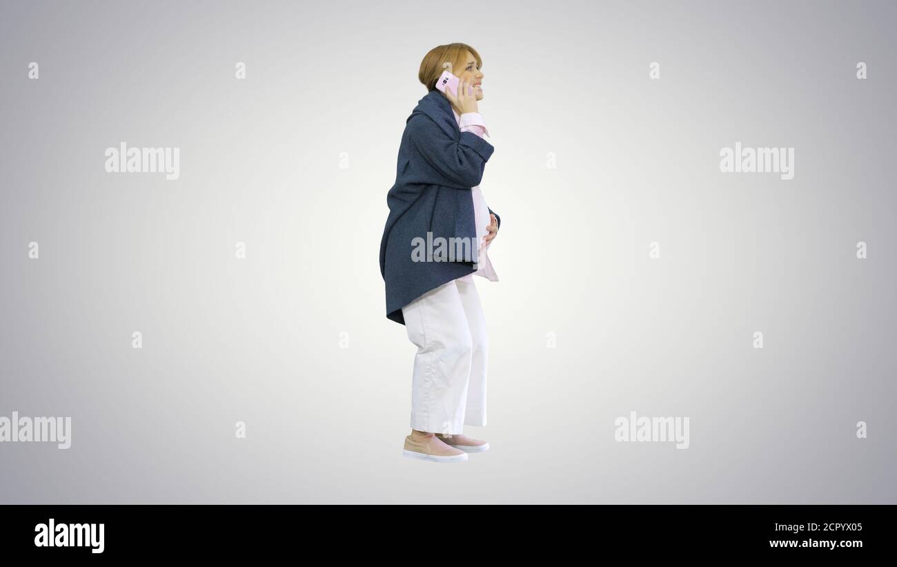 Pregnant woman with contractions feeling pain calling ambulance Stock ...