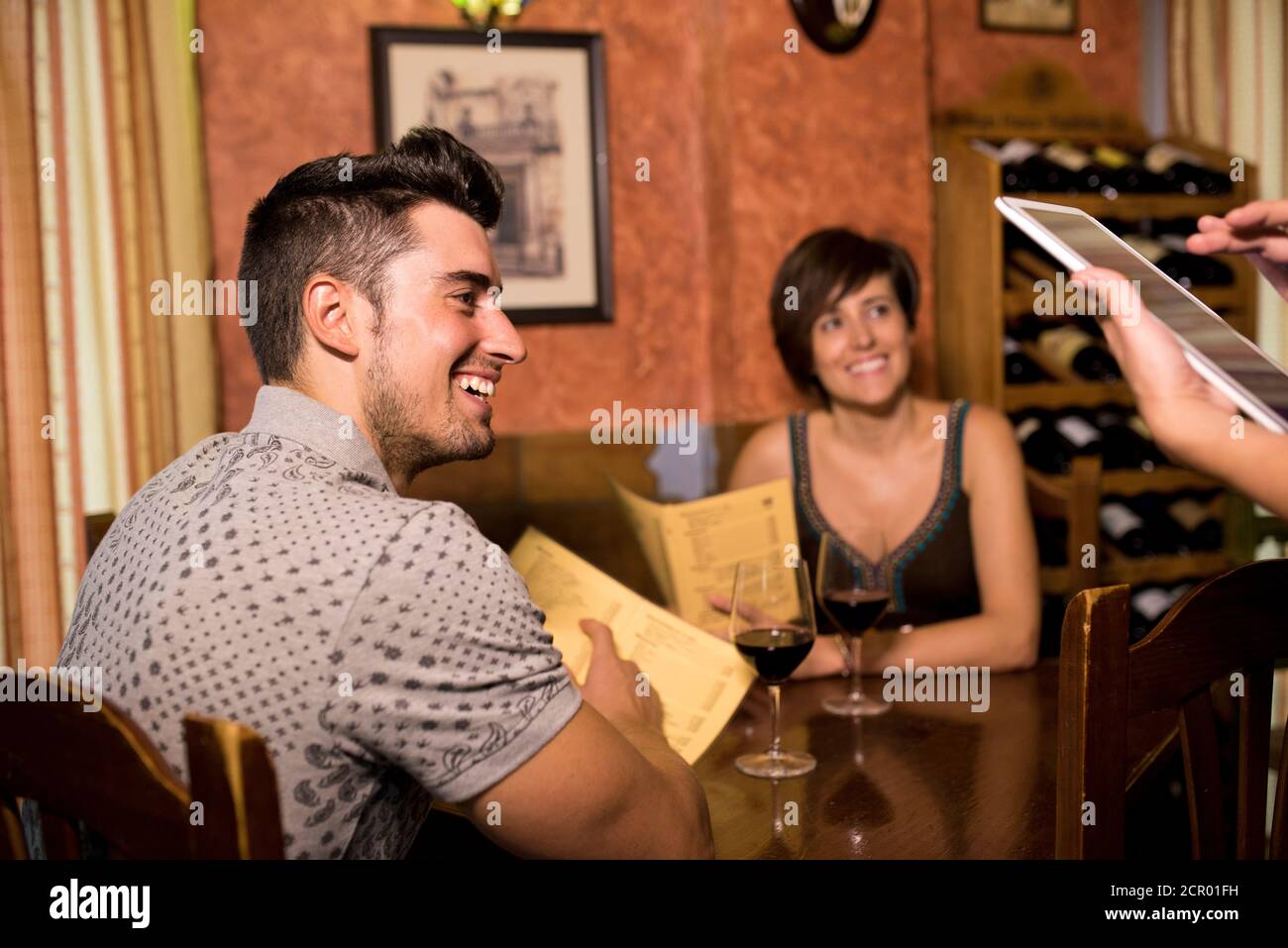Waiter taking order couple hi-res stock photography and images - Alamy